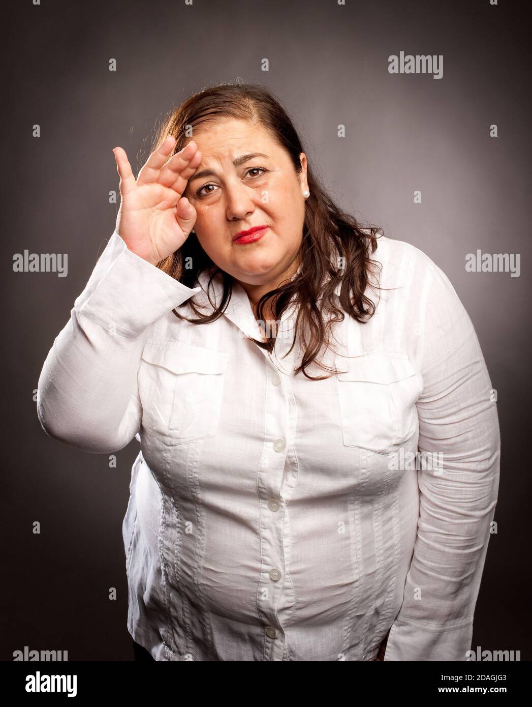 Sad overweight woman holding hi-res stock photography and images - Alamy