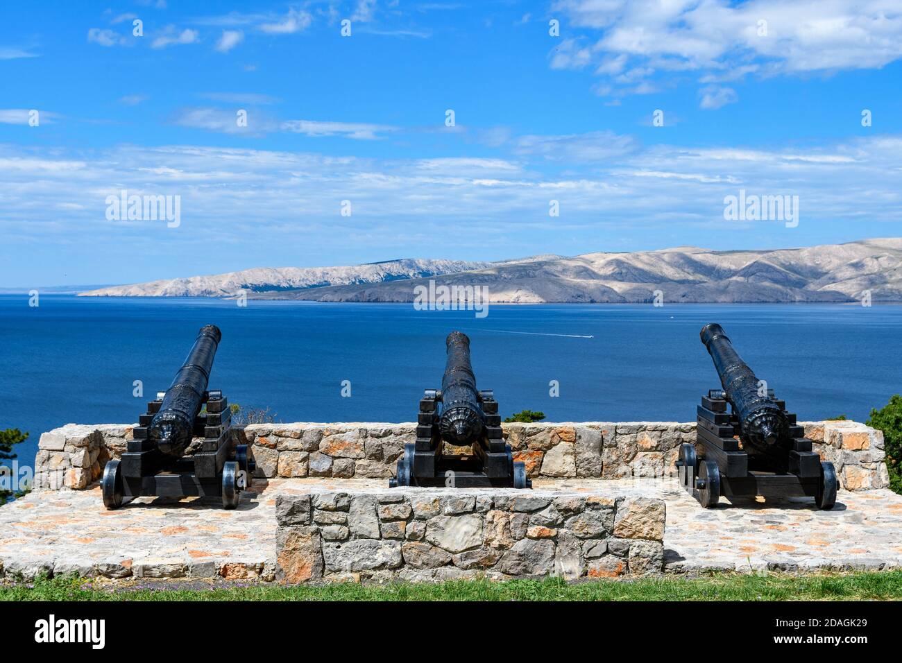 Calm seascape view with old painted cannons on a stone-ground Stock ...