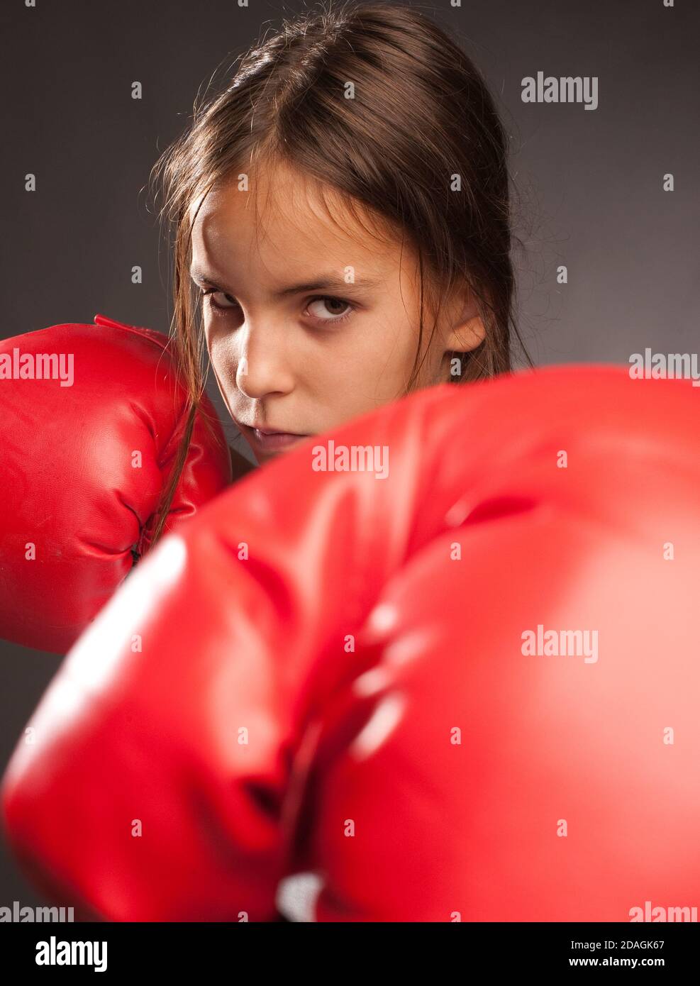 little girl wearing red boxing gloves Stock Photo - Alamy