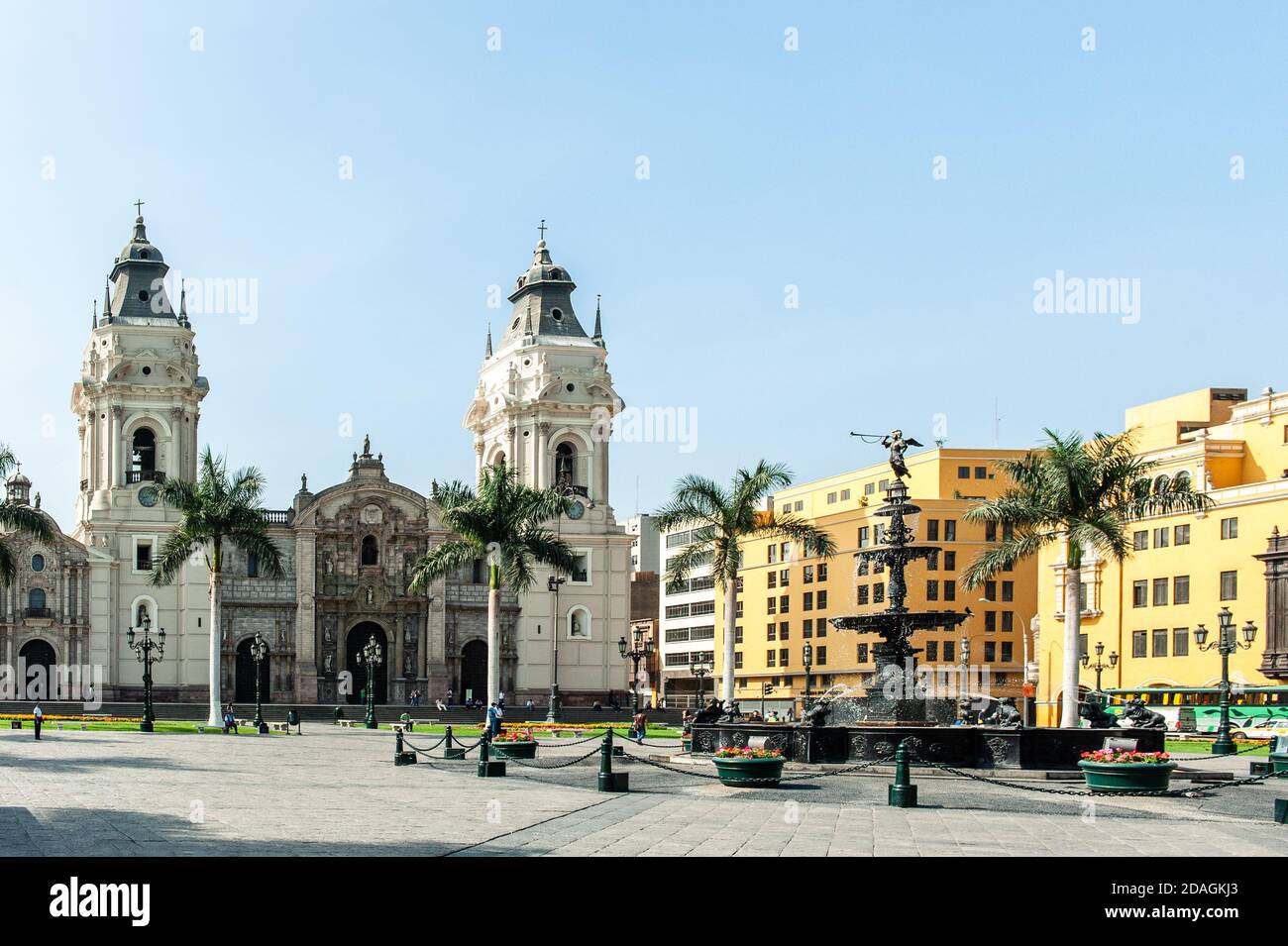The Basilica Cathedral and bronze fountain with the statue of the Angel ...