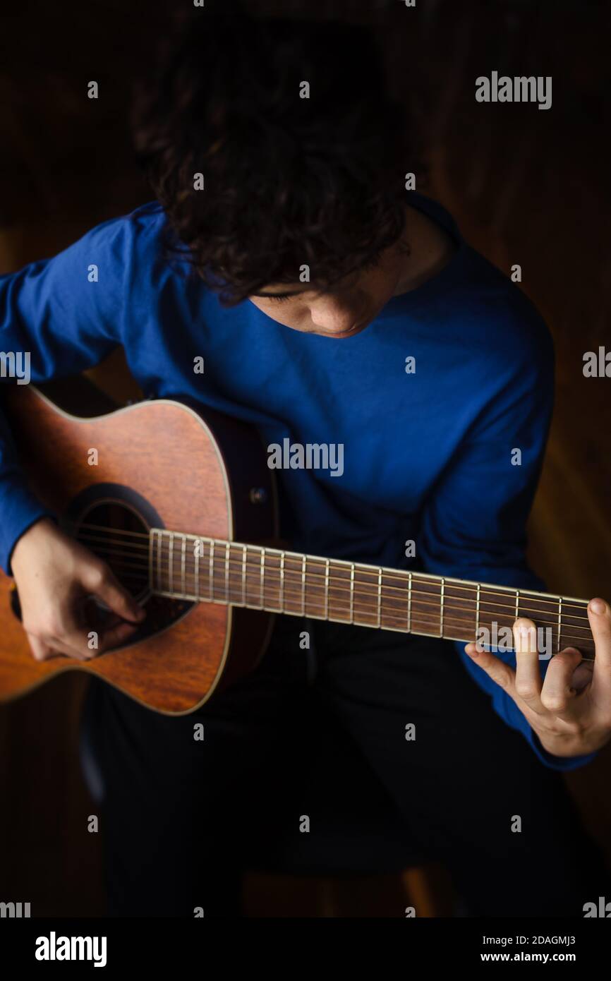 Teens learning to play instruments hi-res stock photography and images ...