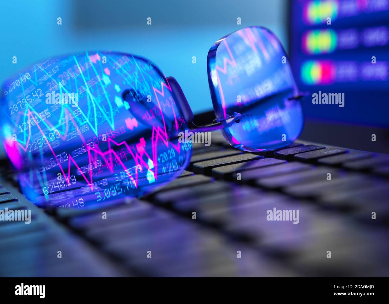 Reflection of financial market data being reflected onto glasses Stock ...
