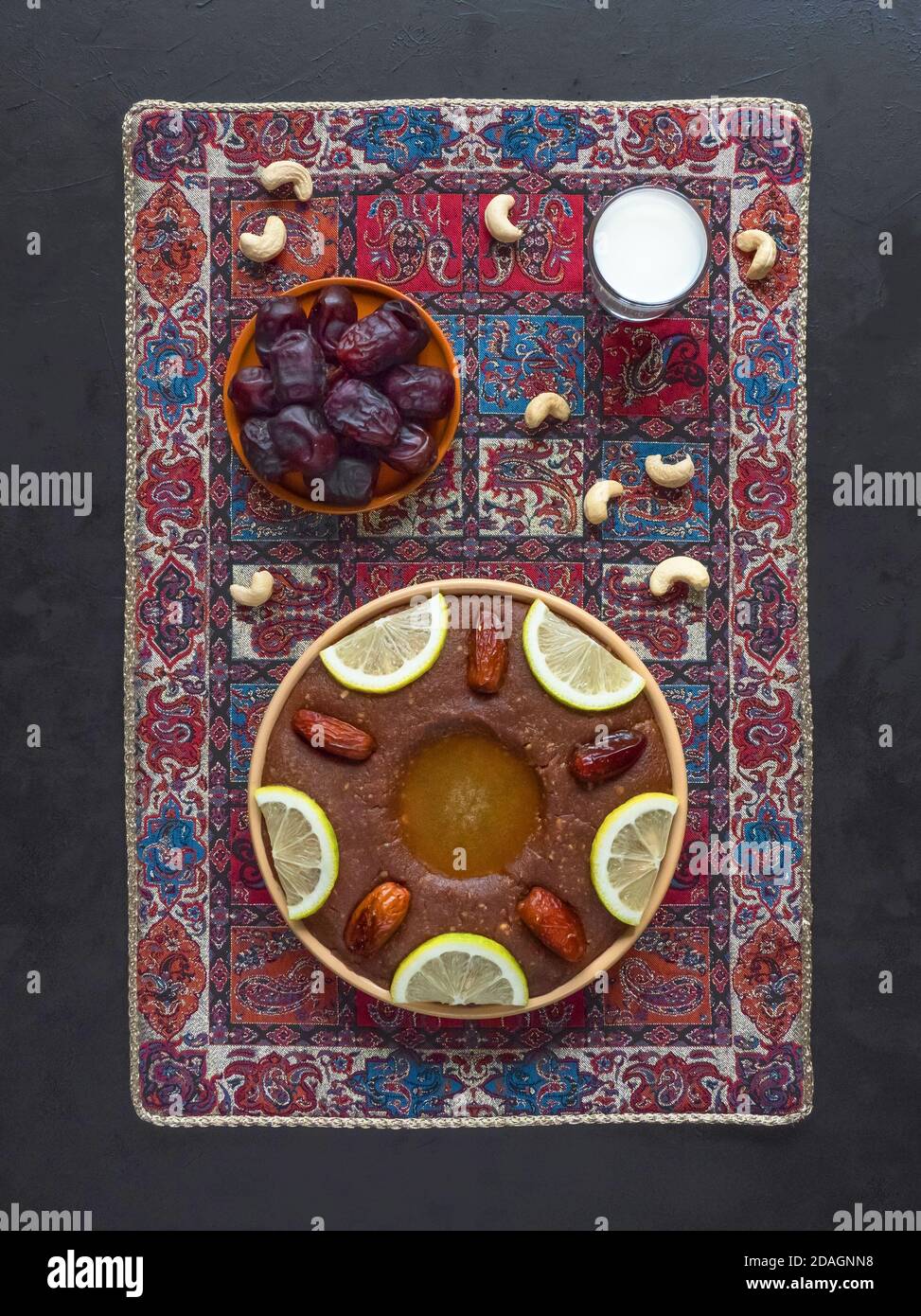 Saudi Arabia traditional dish Hineni, it is a mixed of dates and whole ...