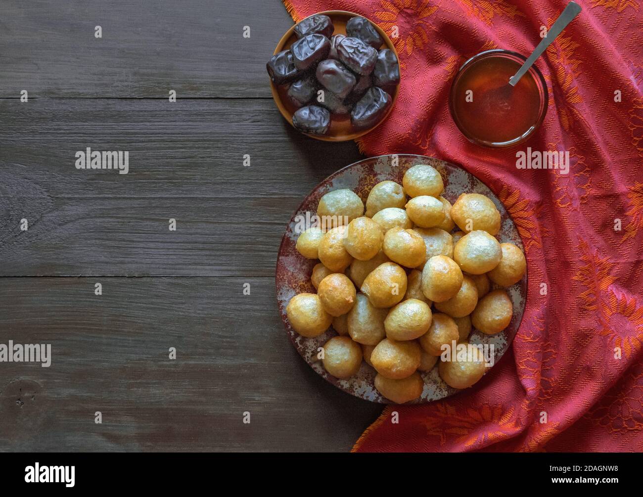 Luqaimat traditional sweet dumplings hi-res stock photography and ...