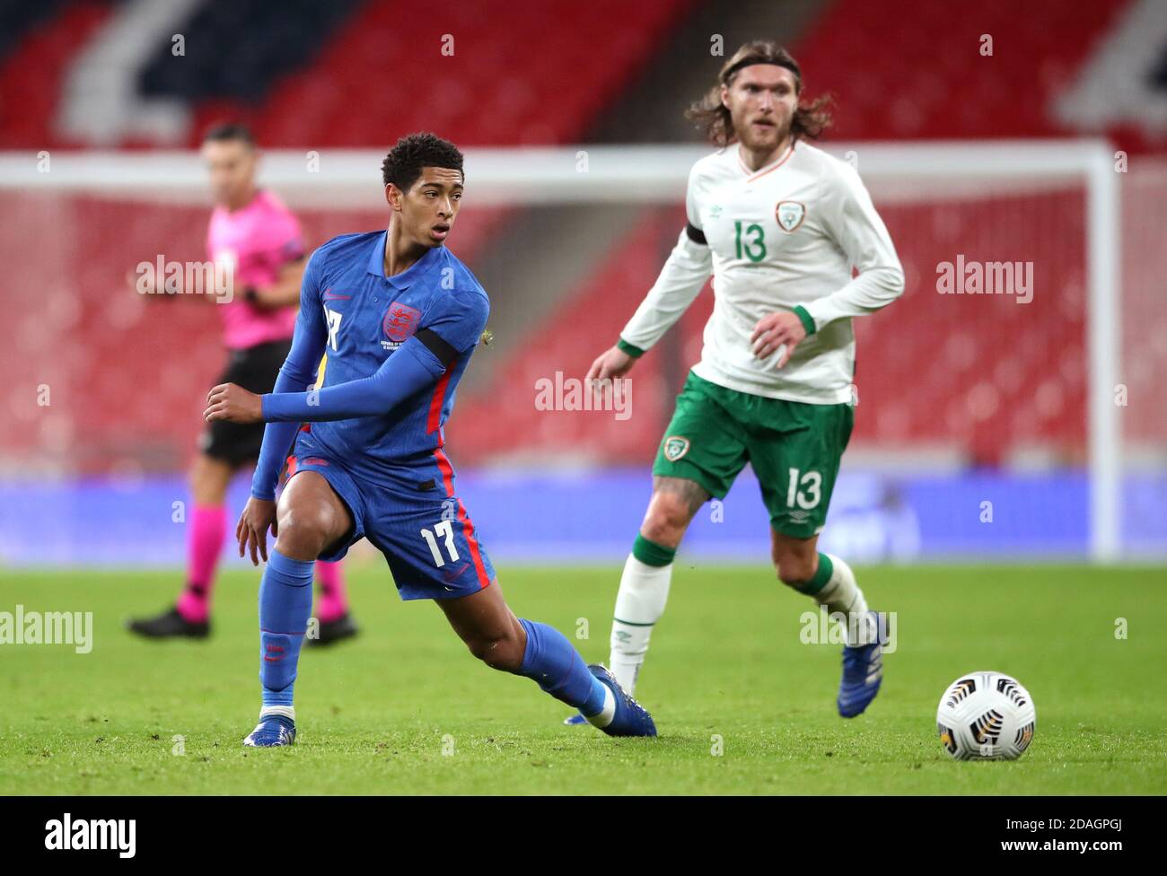 England's Jude Bellingham (left) goes past Republic of Ireland's Jeff ...