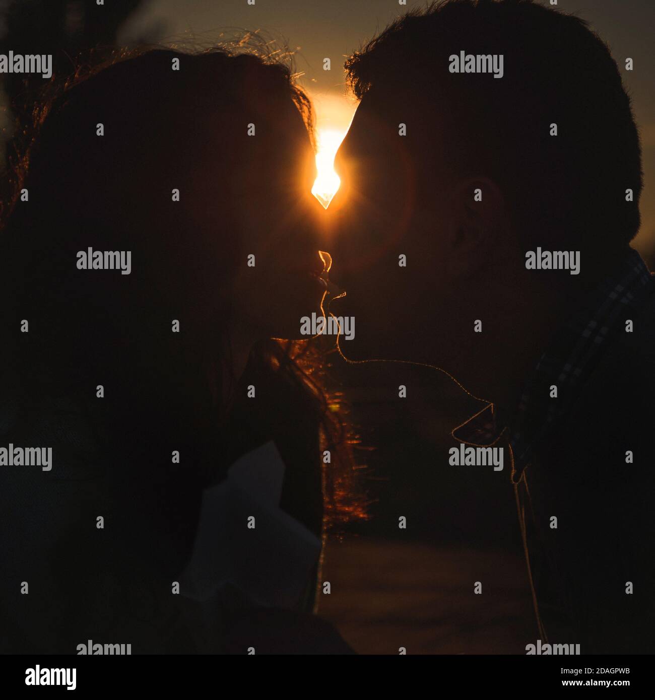 Two teens kissing hi-res stock photography and images - Alamy