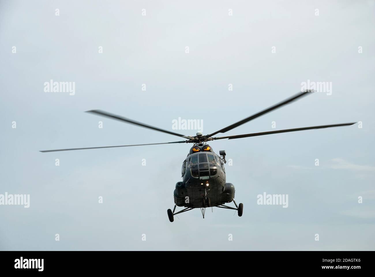 Mi-8 military helicopter in the air, bottom-front view. Photo taken ...