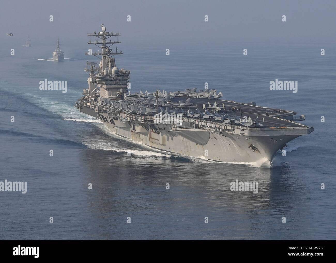 The U.S. Navy Nimitz-class aircraft carrier USS Nimitz sails in ...