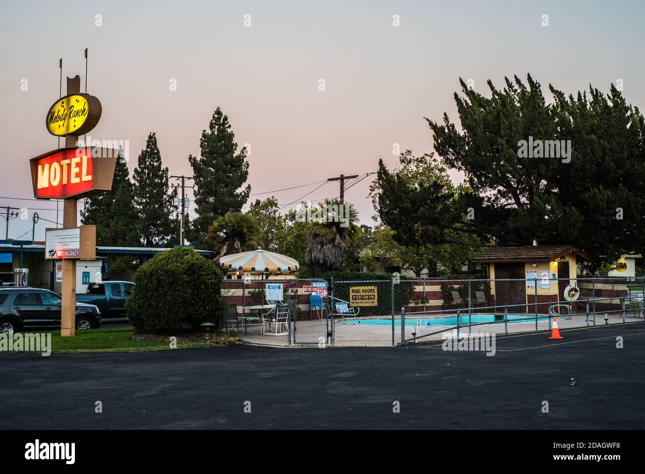 Motel's parking with a swimming pool Stock Photo - Alamy