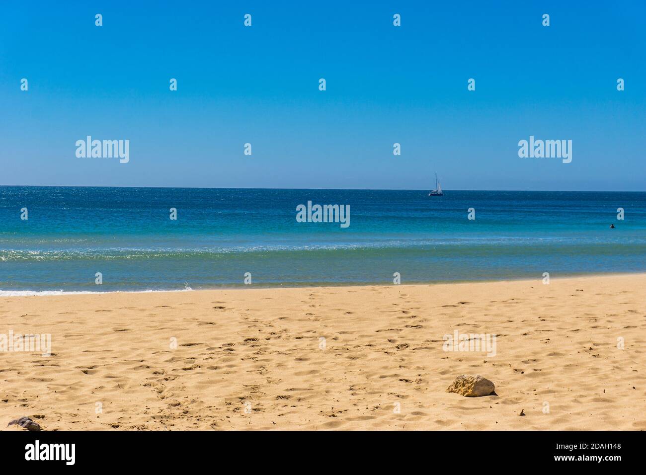 Beautiful beach landscape in summer with far sailing boat Stock Photo ...