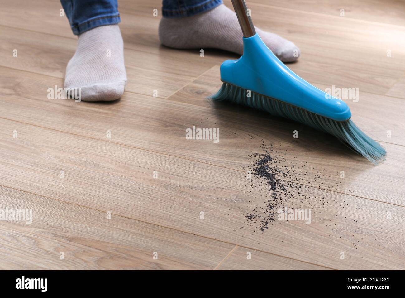 Man sweeping floor dustpan broom High Resolution Stock Photography and ...