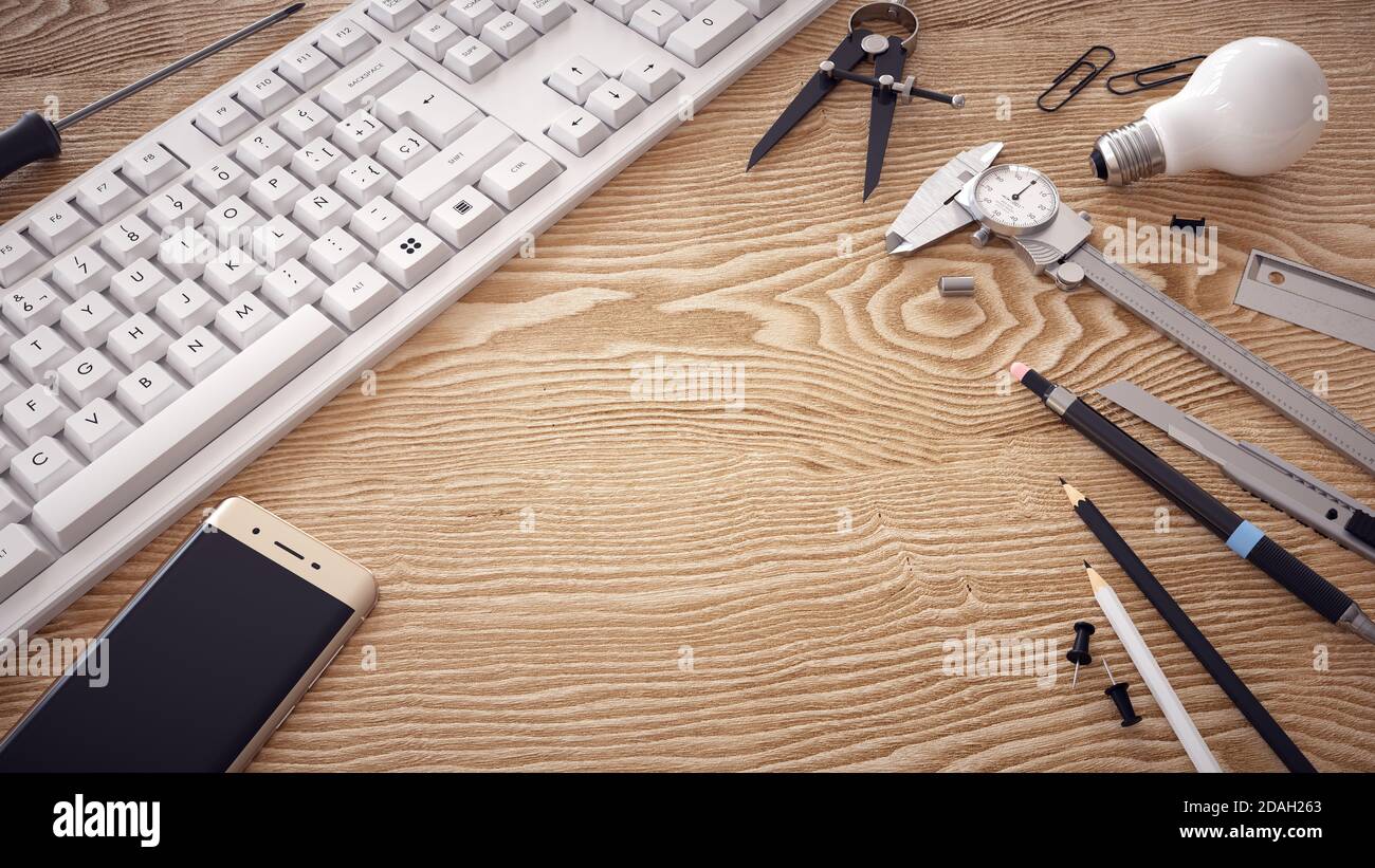 Creative table with various tools to invent Stock Photo - Alamy