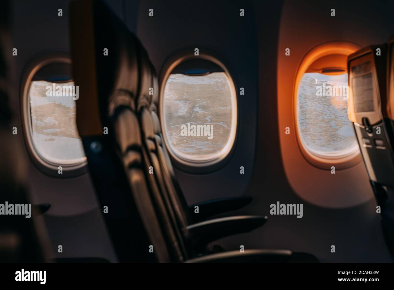 Airplane interior with window view over clouds. Concept of travelling ...