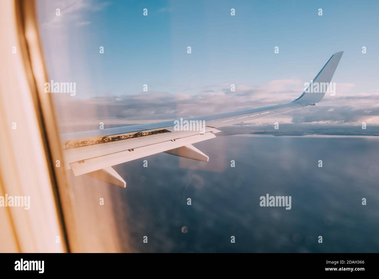Airplane interior with window view of the Baltic sea and clouds Stock ...