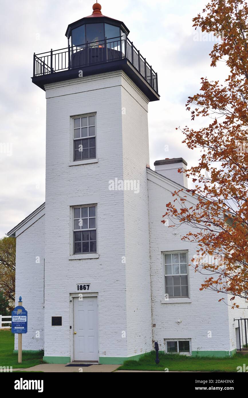 Escanaba, Michigan, USA. The Sand Point Lighthouse on a cloudy but dry ...