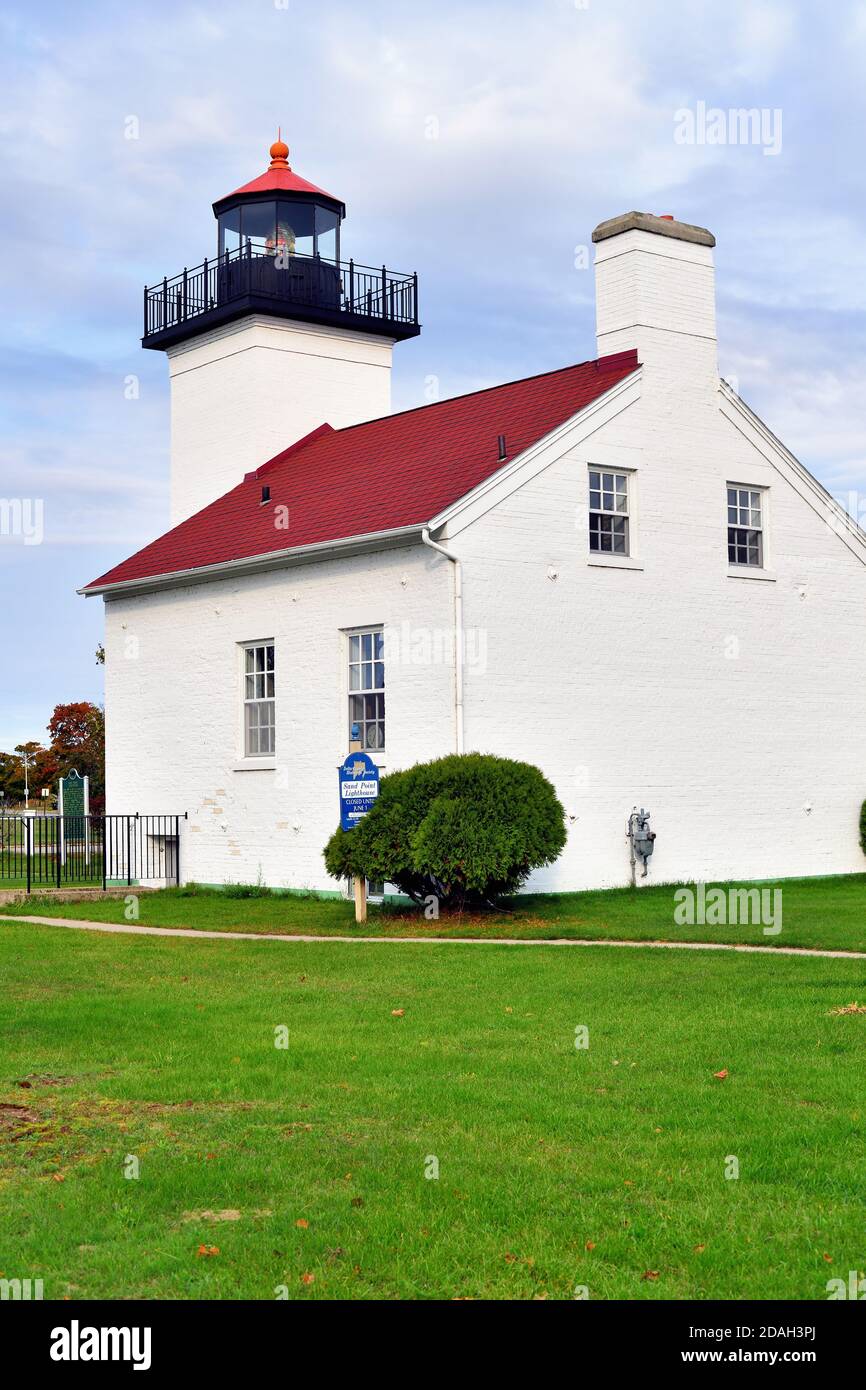 Escanaba, Michigan, USA. The Sand Point Lighthouse on a cloudy but dry ...