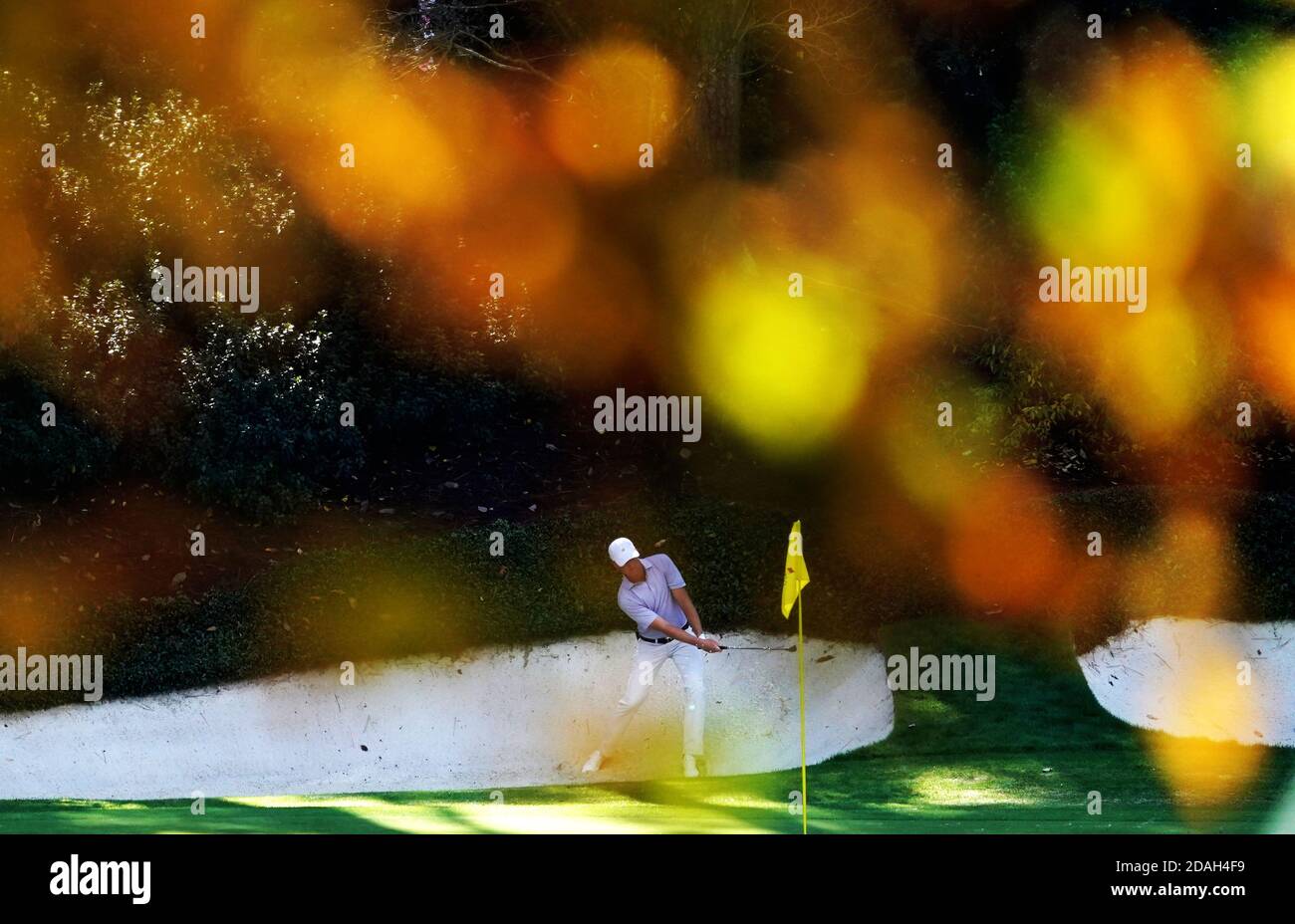 Augusta, United States. 12th Nov, 2020. Andy Ogletree is framed by fall ...