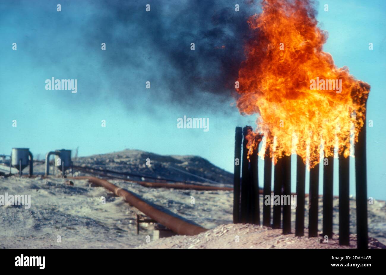 Waste gas flareal- Dukhan oilfield in Qatar 1975 Stock Photo - Alamy