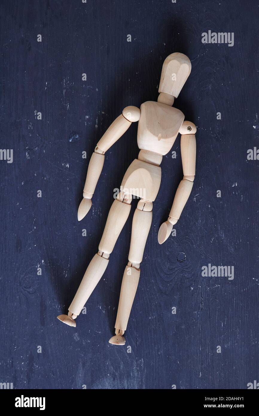 A studio photo of a wooden toy mannequin Stock Photo - Alamy