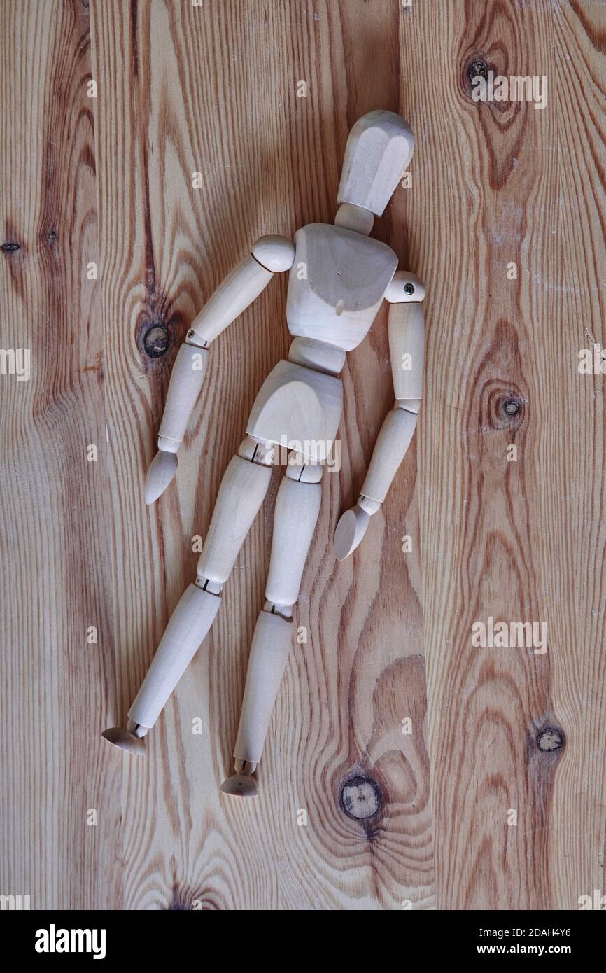 A studio photo of a wooden toy mannequin Stock Photo - Alamy