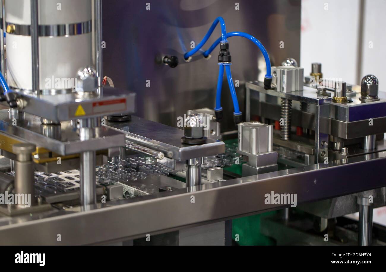 Capsule blister packing machine in pharmaceutical industrial Stock ...
