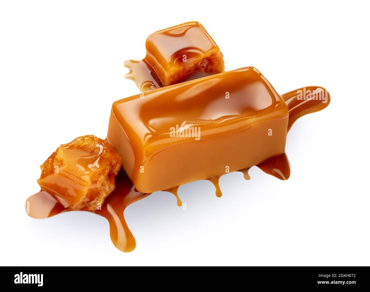 Caramel isolated on white background. Golden Butterscotch toffee candy ...