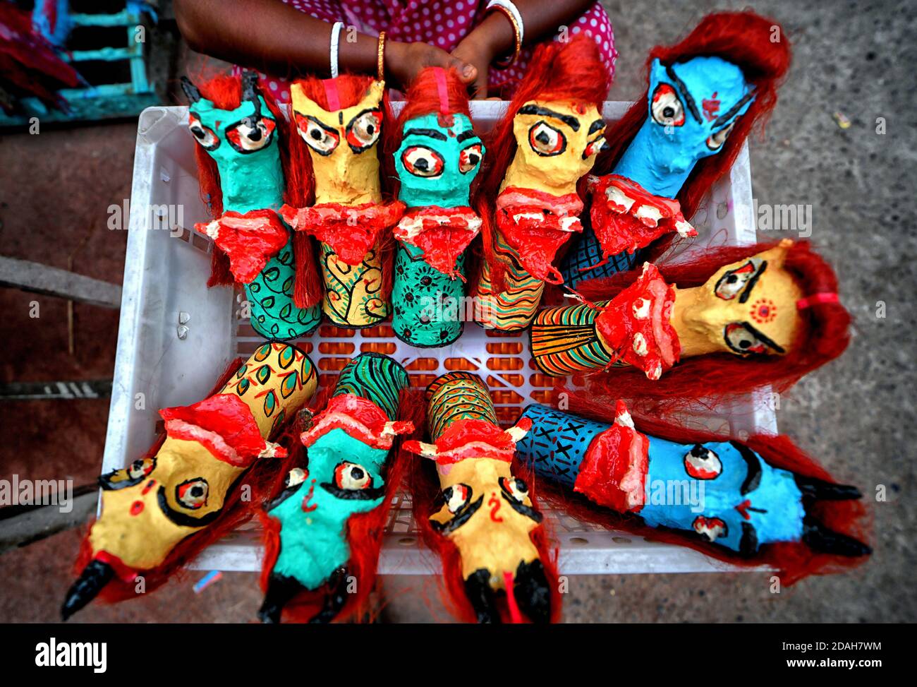 Kolkata, India. 12th Nov, 2020. Demon clay structures are being kept on ...