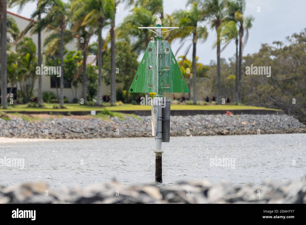 Green marine navigation marker in a river on the gold coast Stock Photo ...