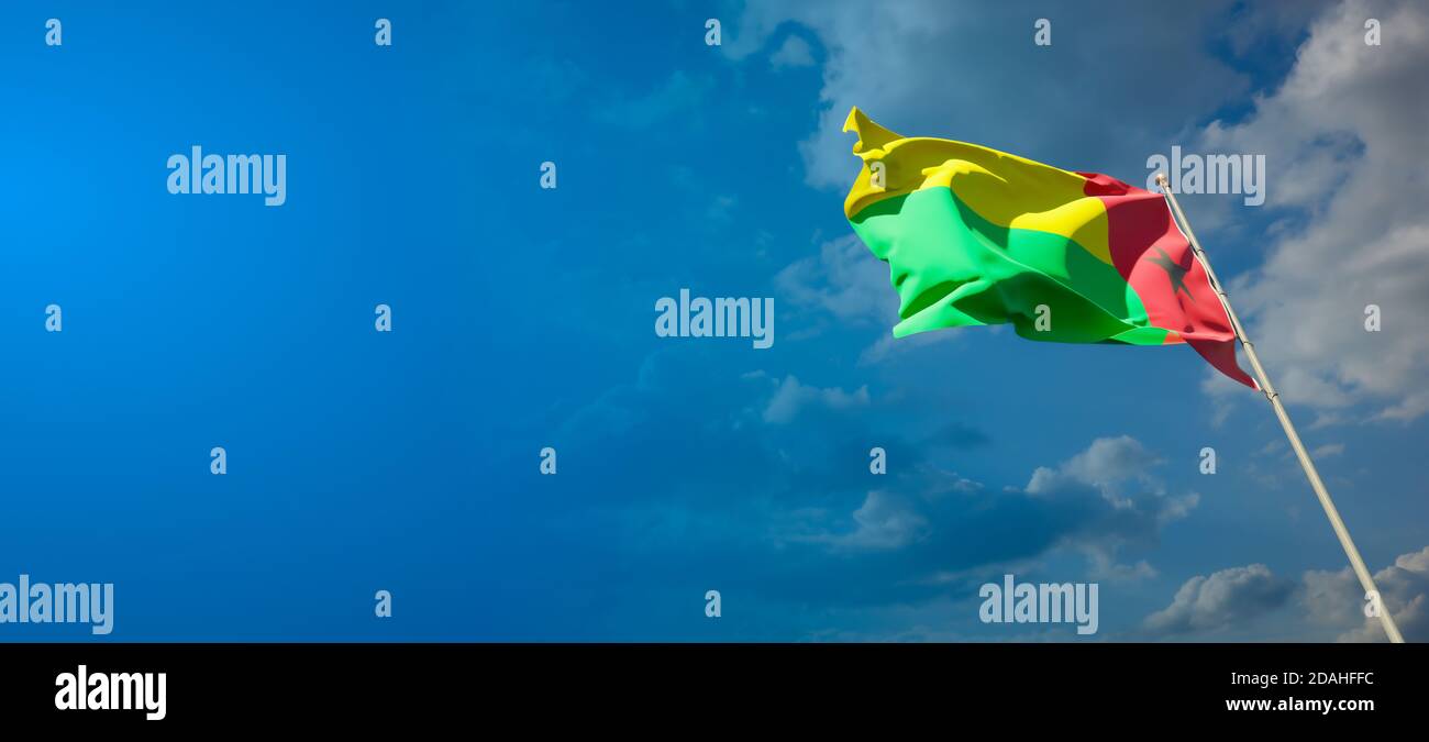 Beautiful national state flag of Guinea-Bissau with blank space. Guinea ...