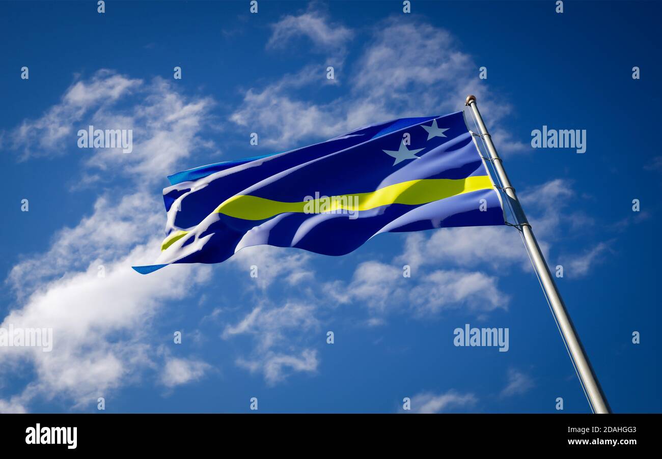 Beautiful national state flag of Curacao fluttering at sky background ...