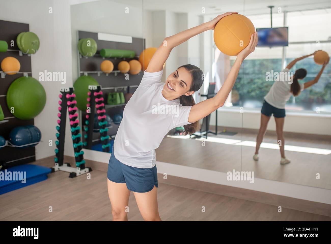 Female figure bending hi-res stock photography and images - Alamy