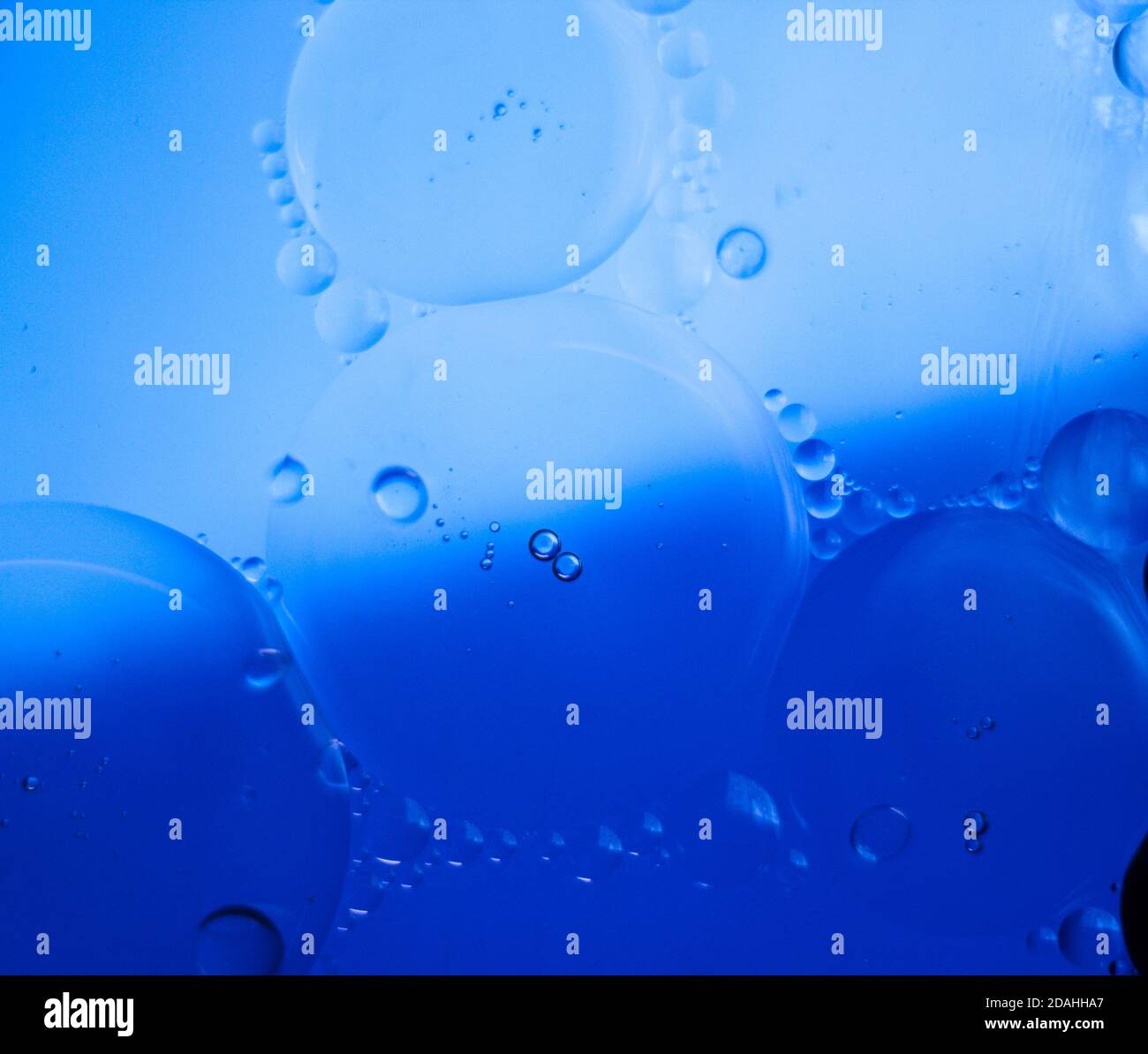 blue abstract background with bubbles and liquid and oily texture Stock ...