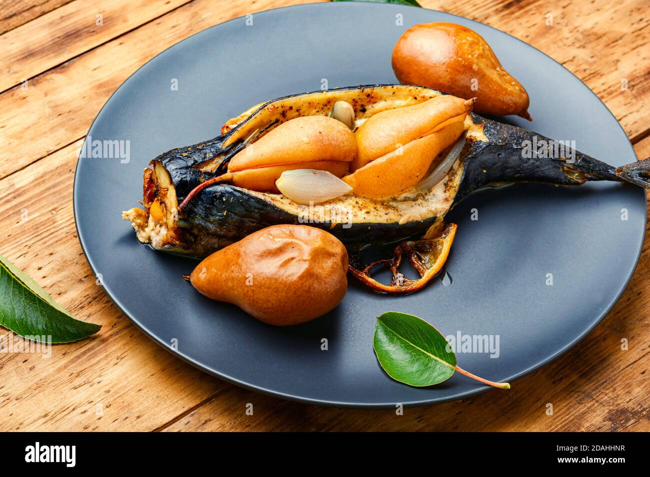 Baked mackerel fish stuffed with autumn pear.Seafood Stock Photo - Alamy