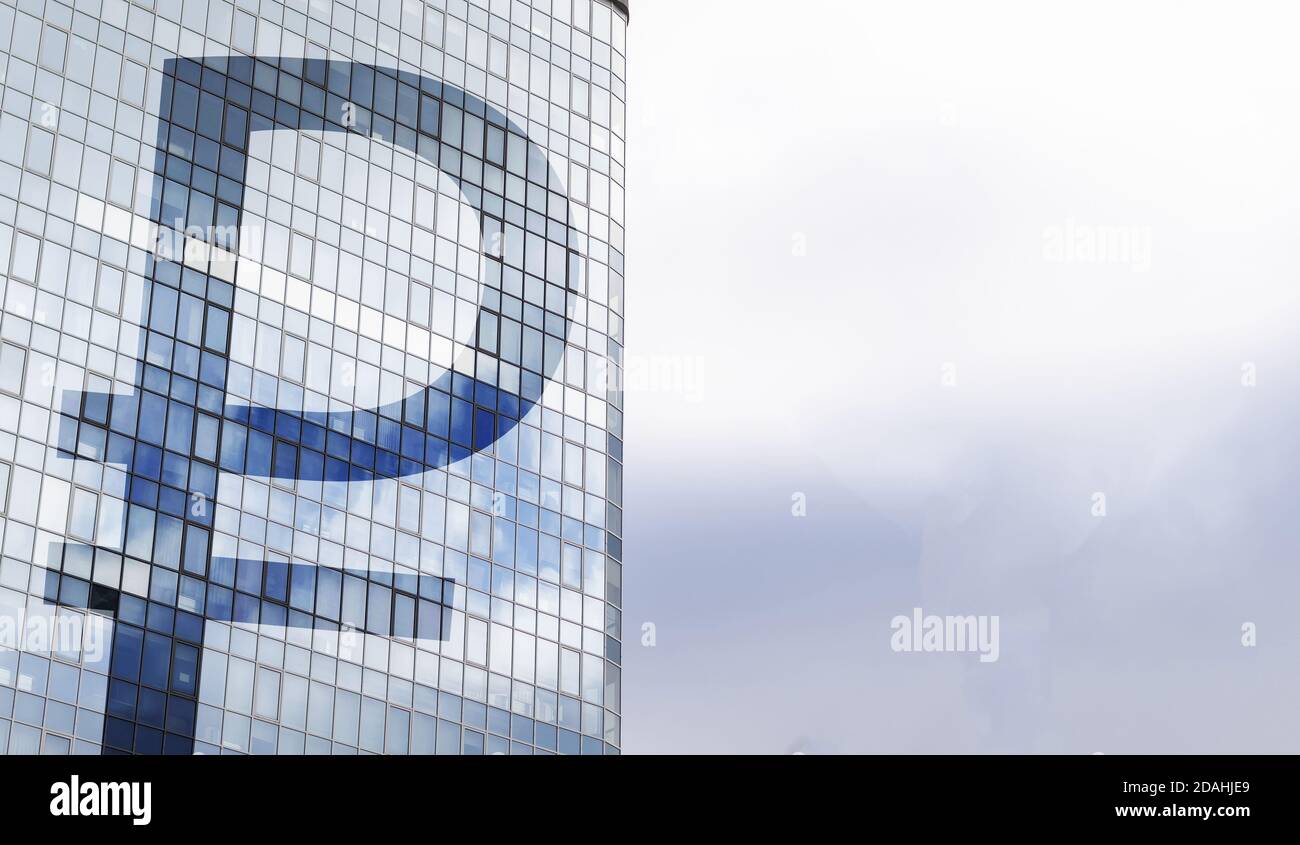 Ruble sign on a skyscraper building. Business and financial concept ...