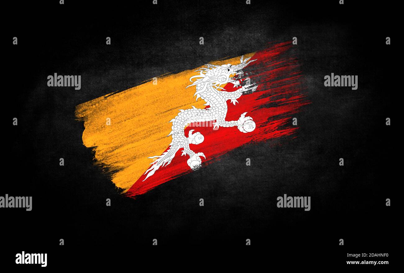 smear of paint in the form of the flag of Butane close-up on a black ...