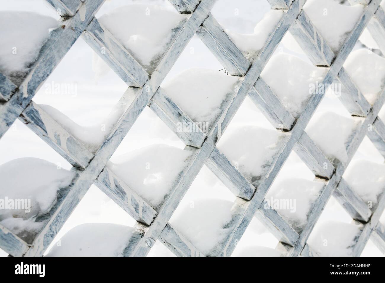 fencing winter snow lath season Stock Photo - Alamy