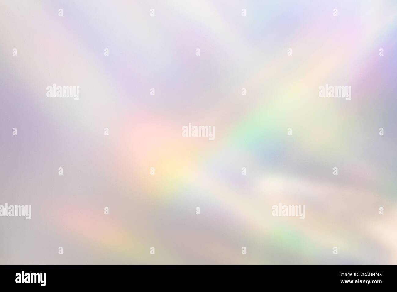 Blurred rainbow light refraction texture on white wall Stock Photo - Alamy