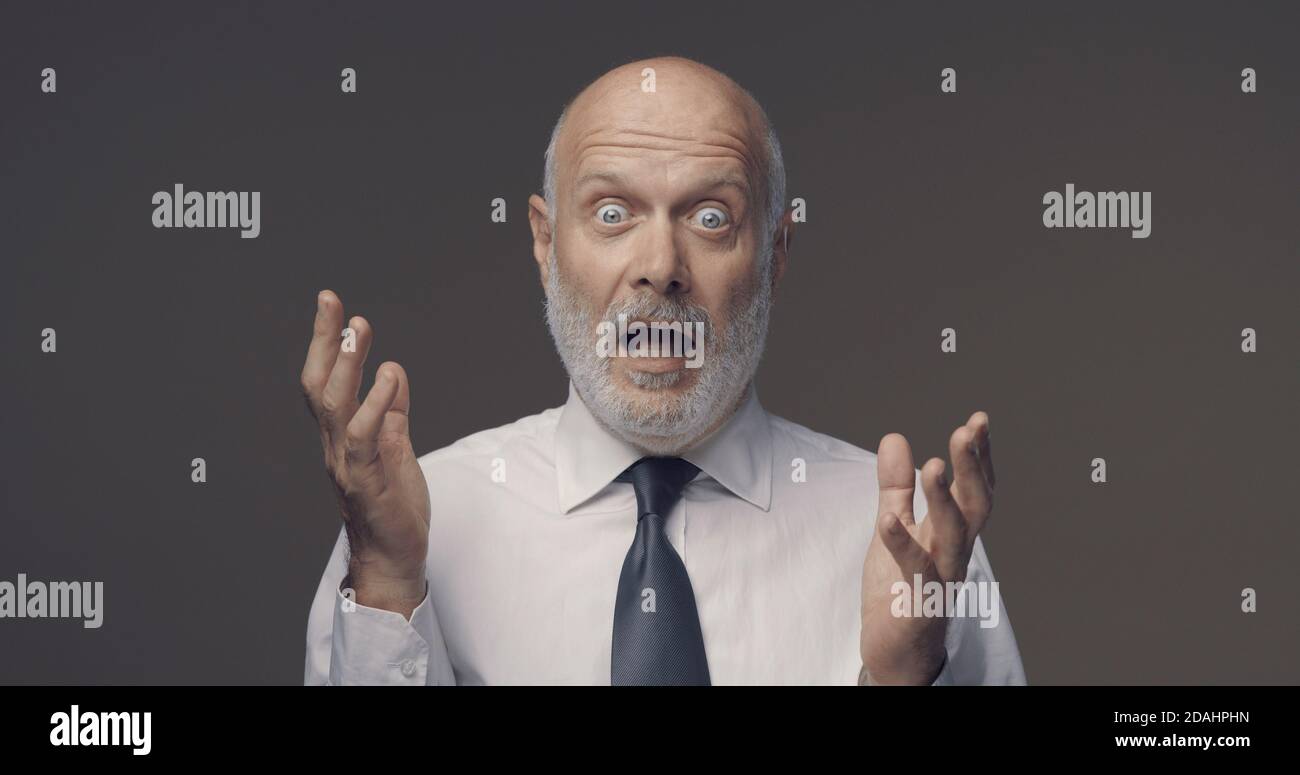 Shocked middle aged businessman hi-res stock photography and images - Alamy