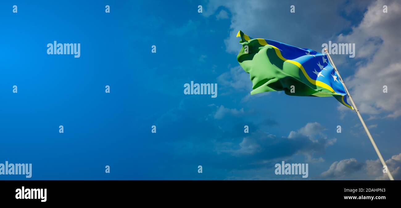 Beautiful national state flag of Solomon Islands with blank space ...