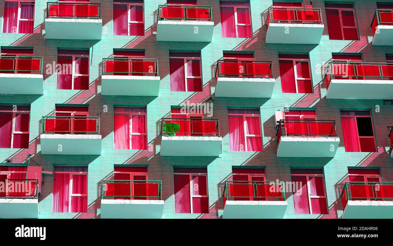 Photos of bright balconies in a multi-storey building Stock Photo - Alamy