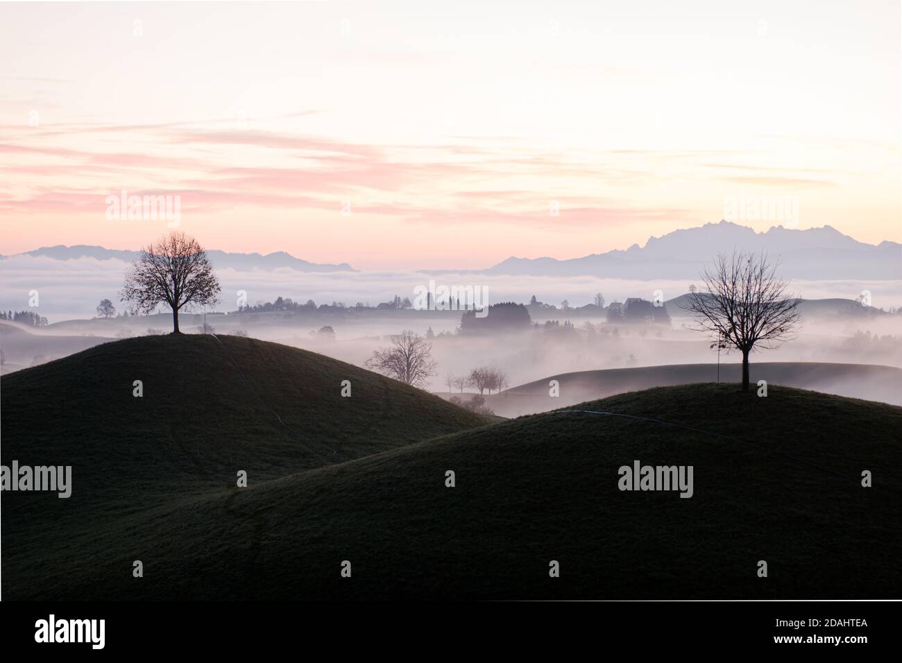 Sunrise over foggy mountain hi-res stock photography and images - Alamy
