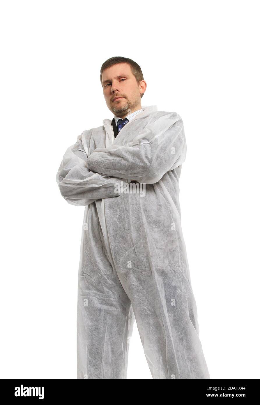 Male in full protective clothing with crossed arms isolated on a white ...