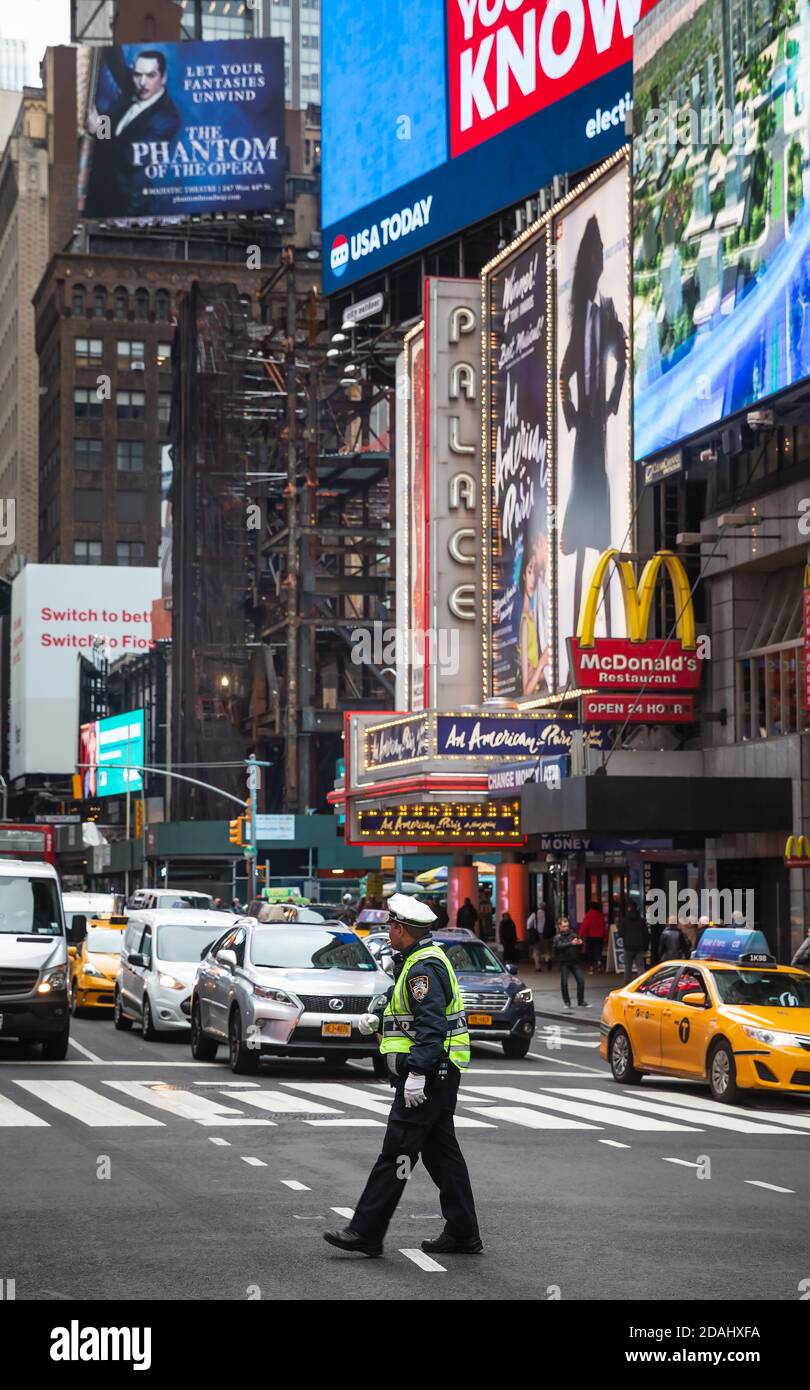 NEW YORK, USA - May 03, 2016: Police officer performing his duties on ...