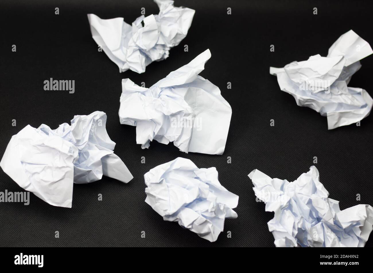 A few crumpled pieces of white paper Stock Photo - Alamy