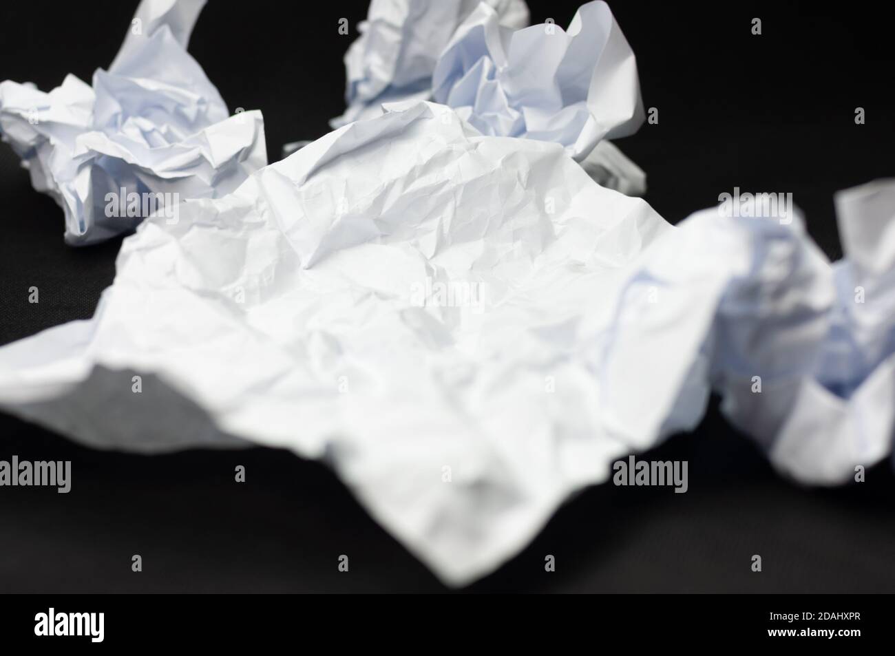 A few crumpled pieces of white paper Stock Photo - Alamy