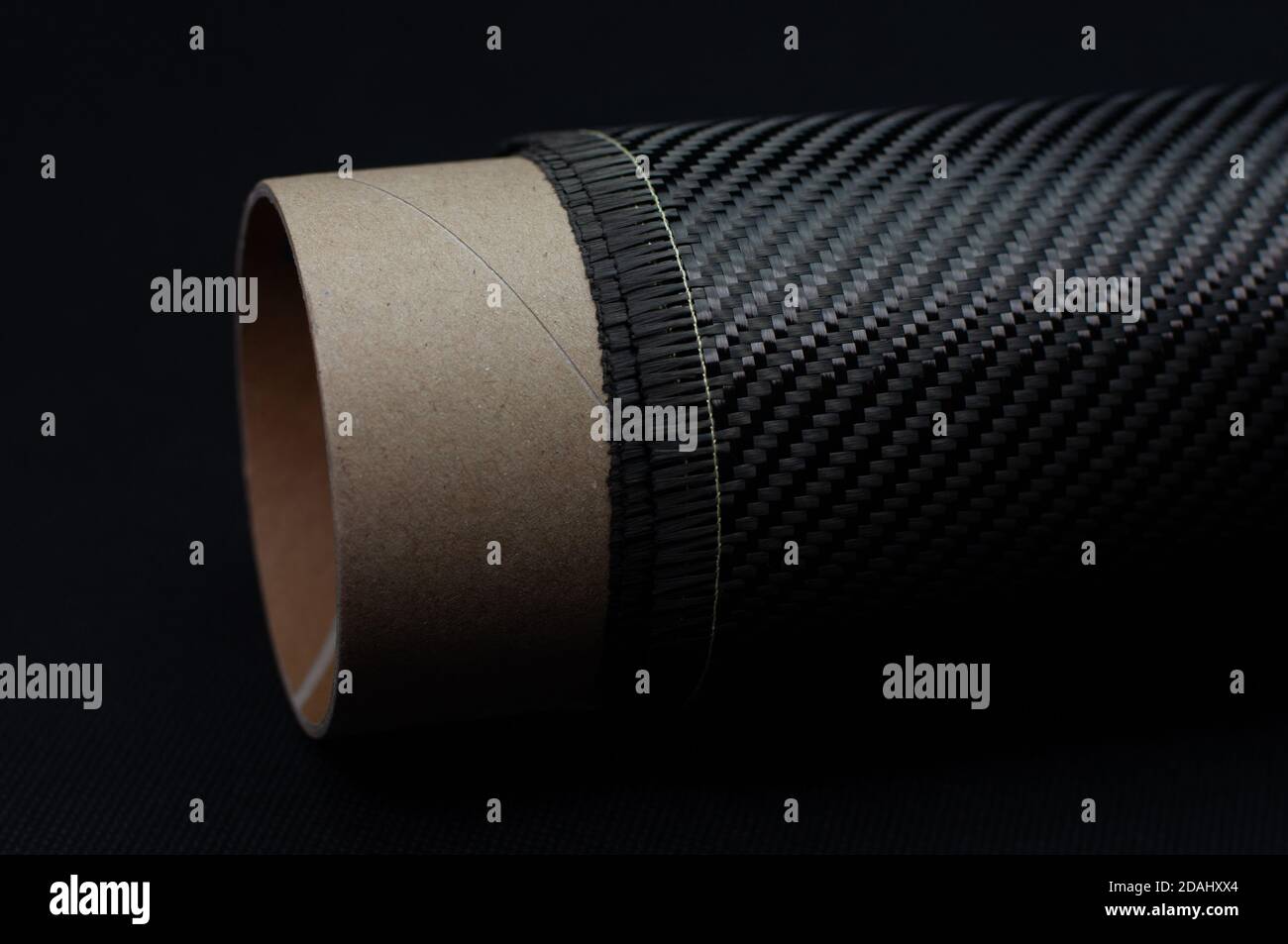 Carbon fiber with twill weave on carton roll Stock Photo - Alamy