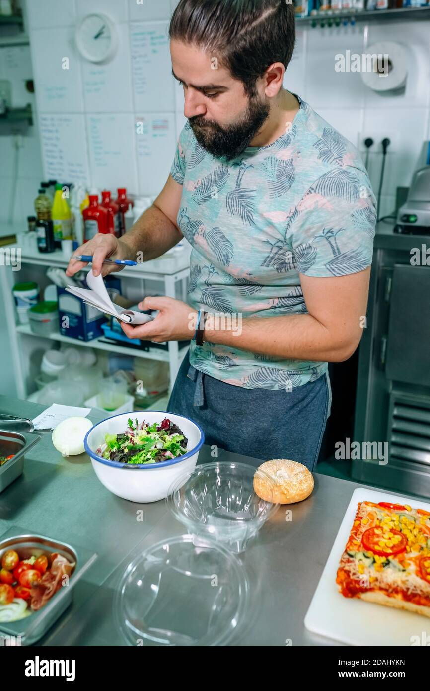 Takeaway orders kitchen hi-res stock photography and images - Alamy