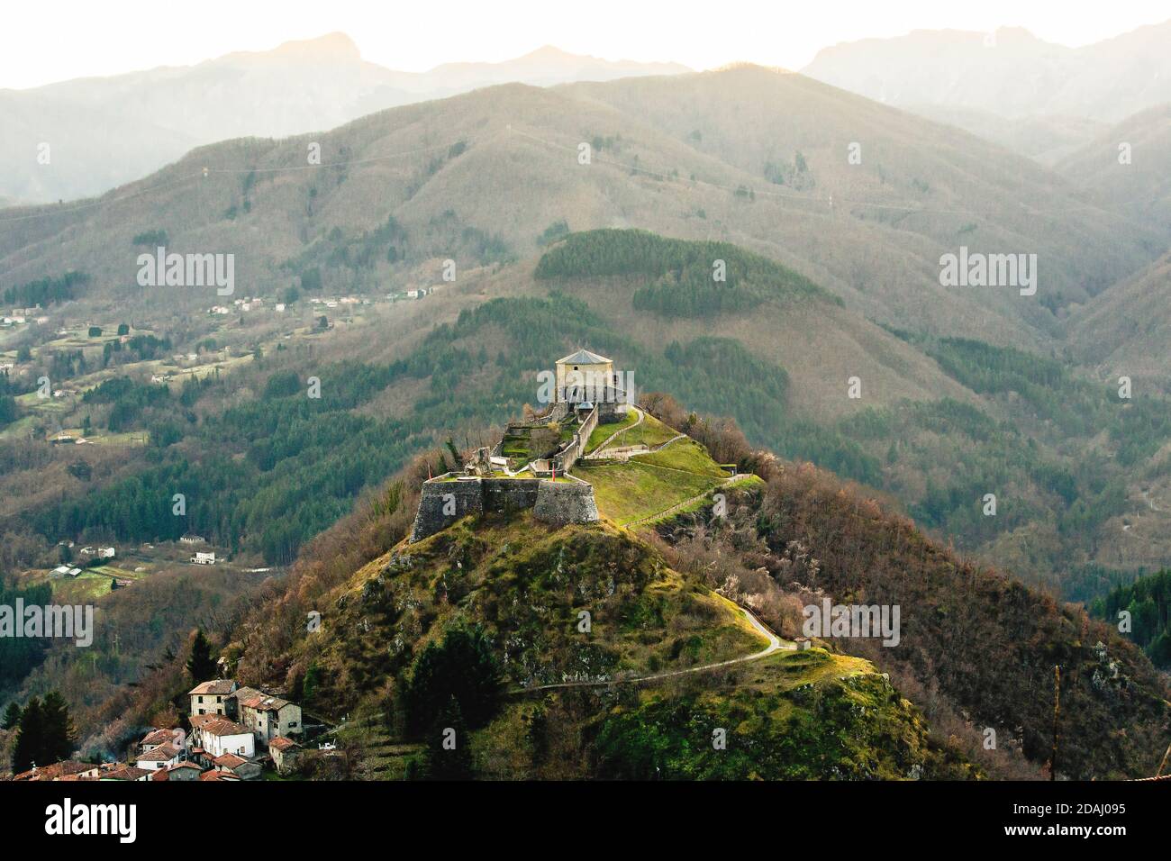 Scenic view of the fortress Verrucole Castle on top of hills during ...