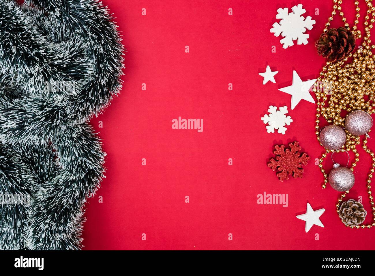 Decorated red Christmas background with christmassy ornaments and ...