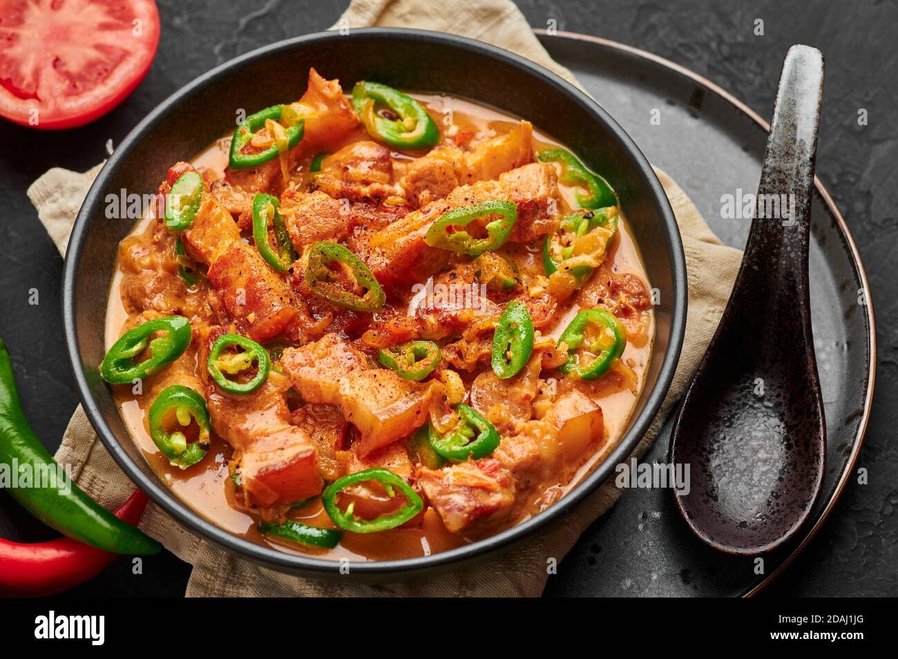 Bicol Express Stew in black bowl on dark slate table top. Filipino ...